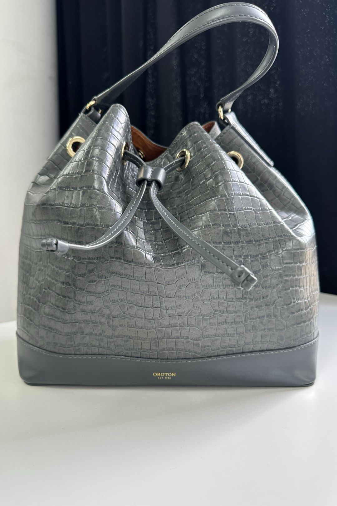Buy Grey Croc Embossed Leather Bucket Bag | Oroton | GlamCorner