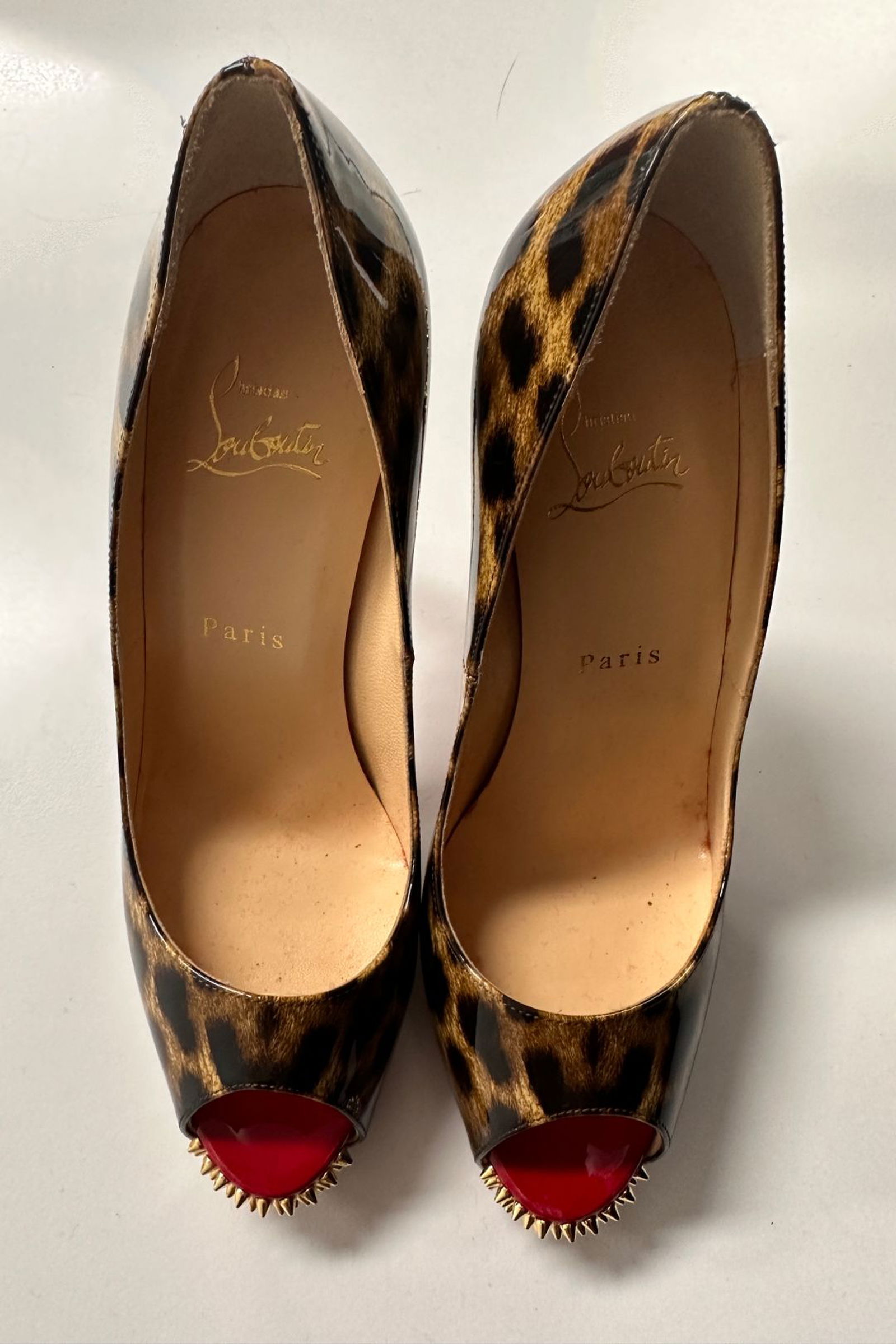 Buy Leopard Print Patent Leather Pumps | Christian Louboutin | GlamCorner